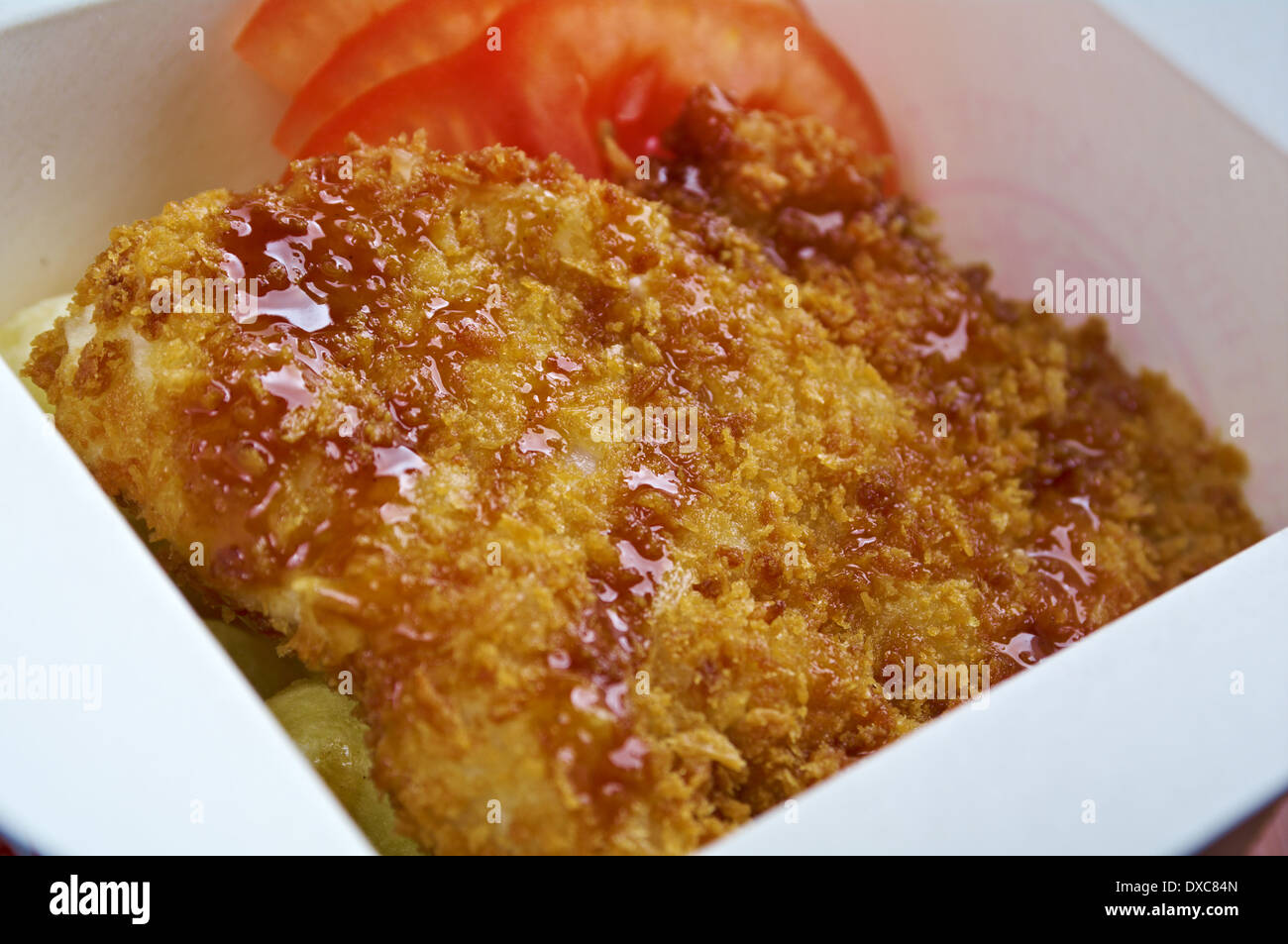 Pork roasted coating. traditional japanese food in take-out box Stock ...