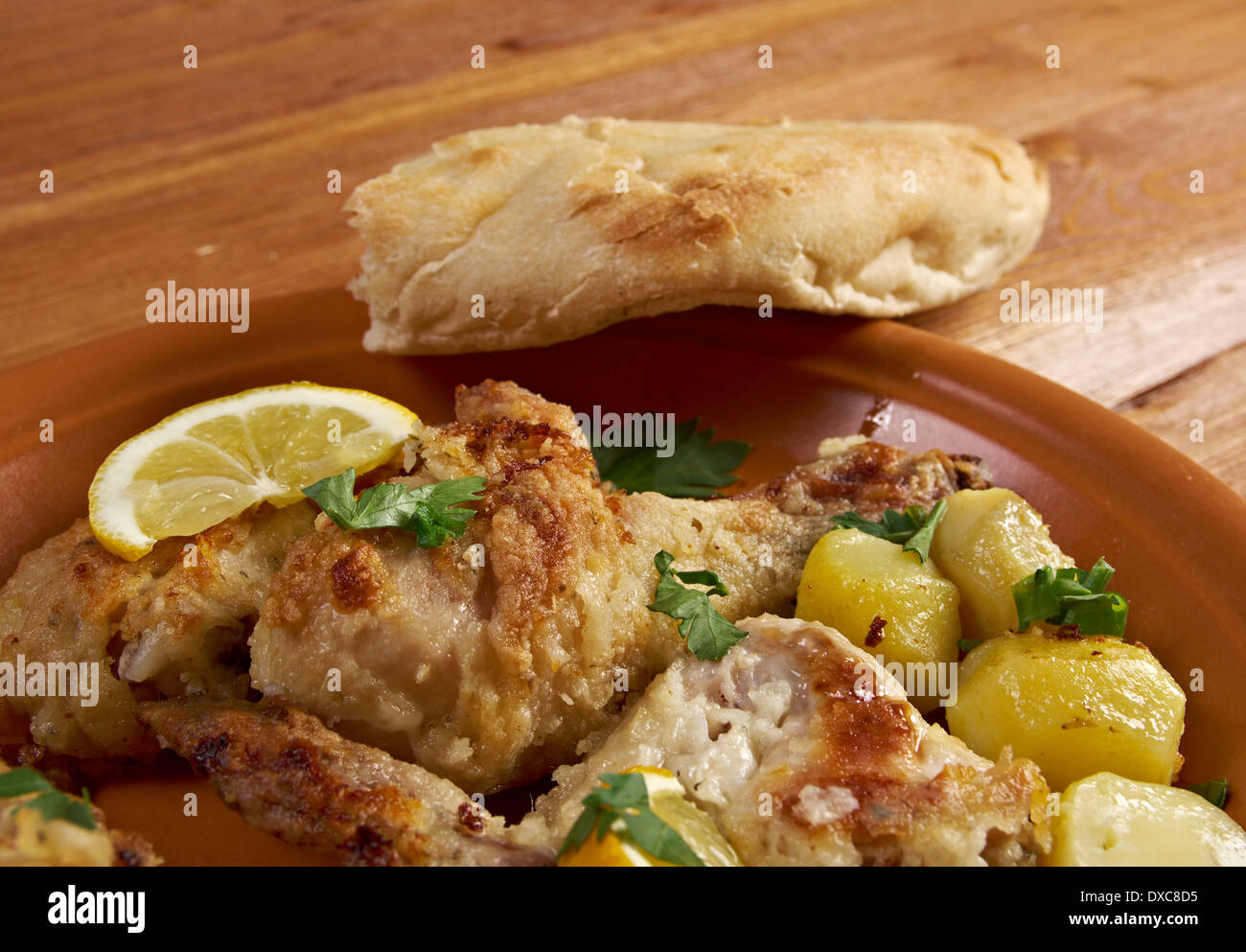 Kotopoulo Lemonato.Greek Lemon Chicken with Crispy Potatoes Stock Photo ...