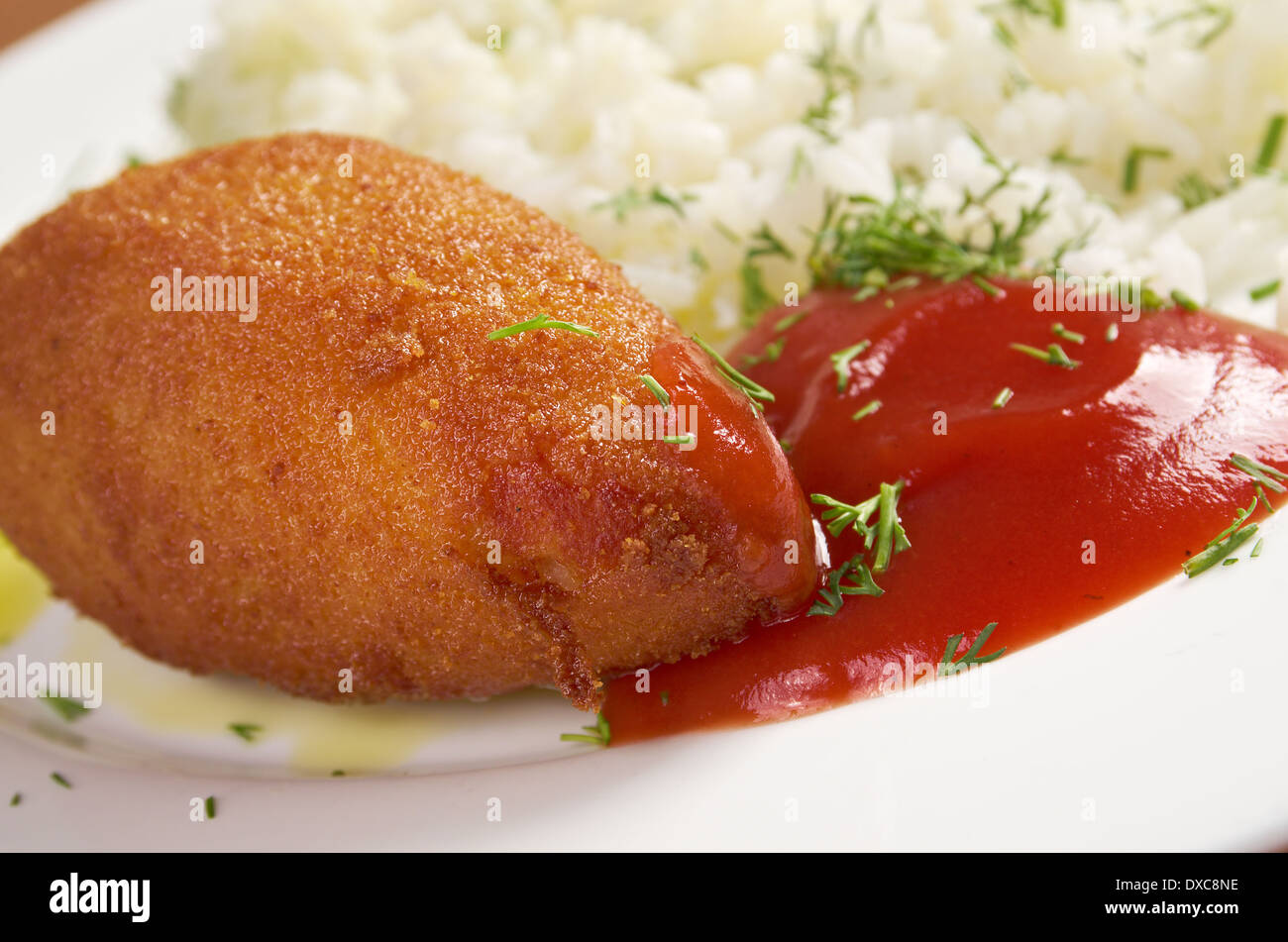 chicken kiev with rice Stock Photo - Alamy