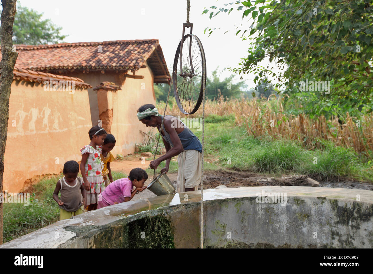 Children fetching water hi-res stock photography and images - Alamy