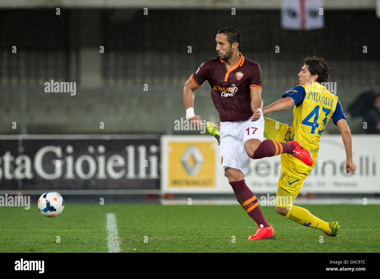 Verona, Italy. 22nd Mar, 2014. Mehdi Benatia (Roma), Alberto Paloschi ...