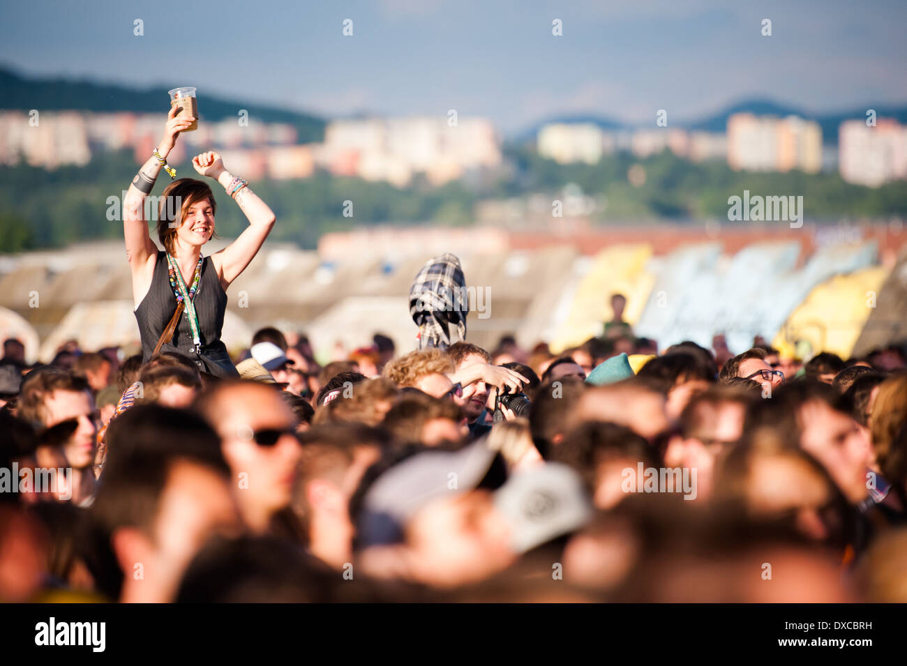 Girl sitting on shoulders hi-res stock photography and images - Alamy