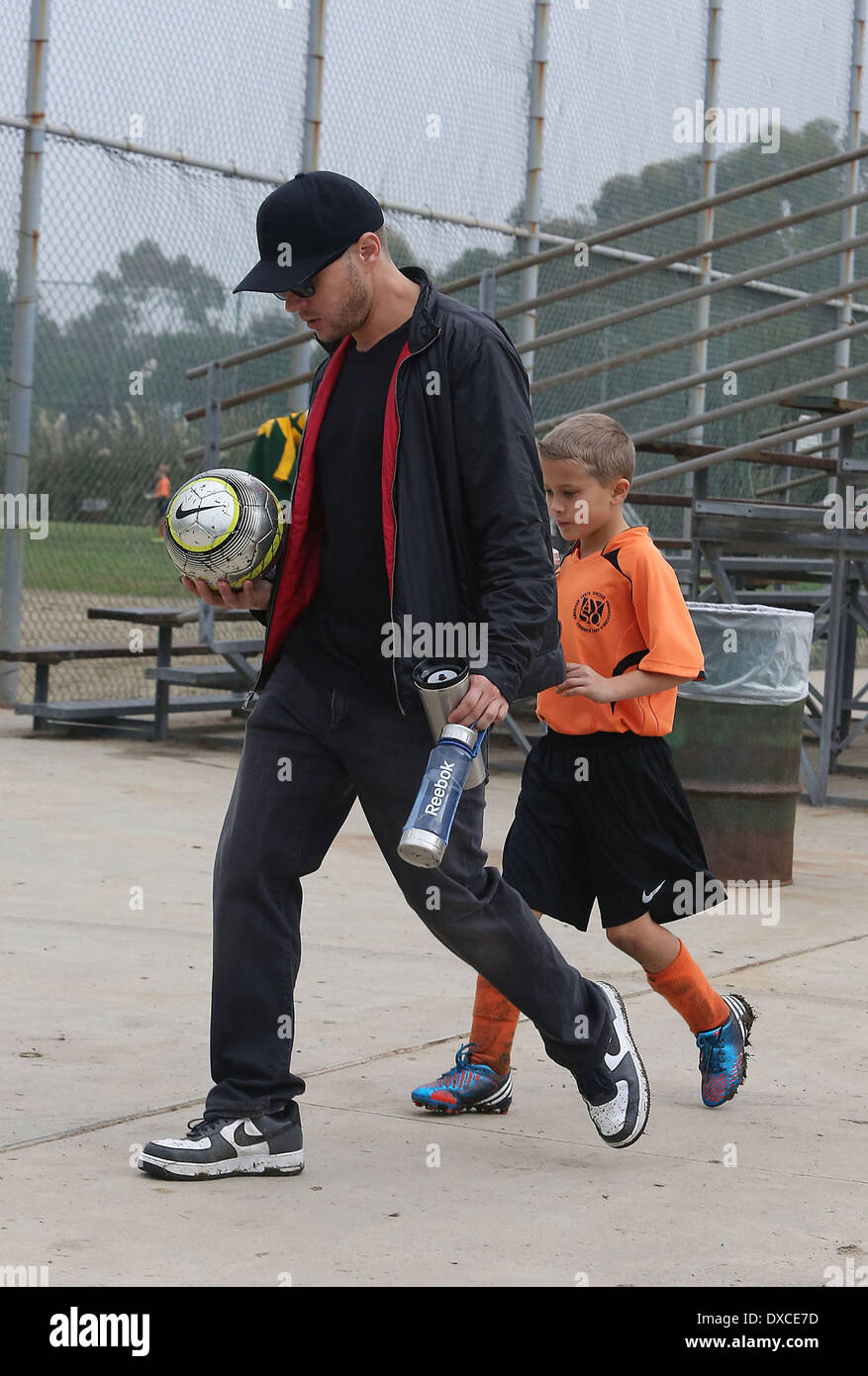 Ryan Phillippe watches her son Deacon's soccer game at a park in ...