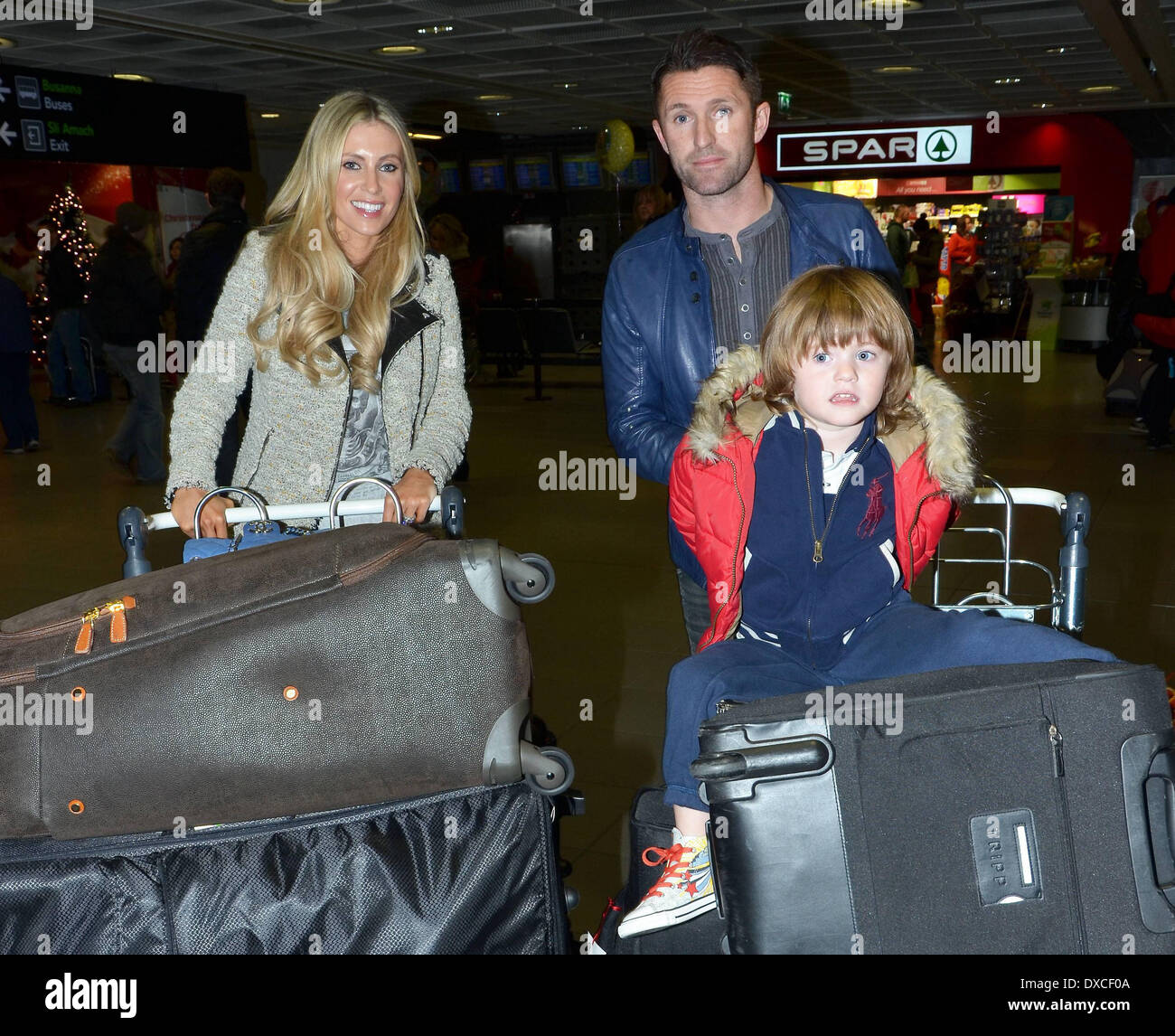 Robbie Keane and Claudine Keane arriving at Dublin Airport with their ...