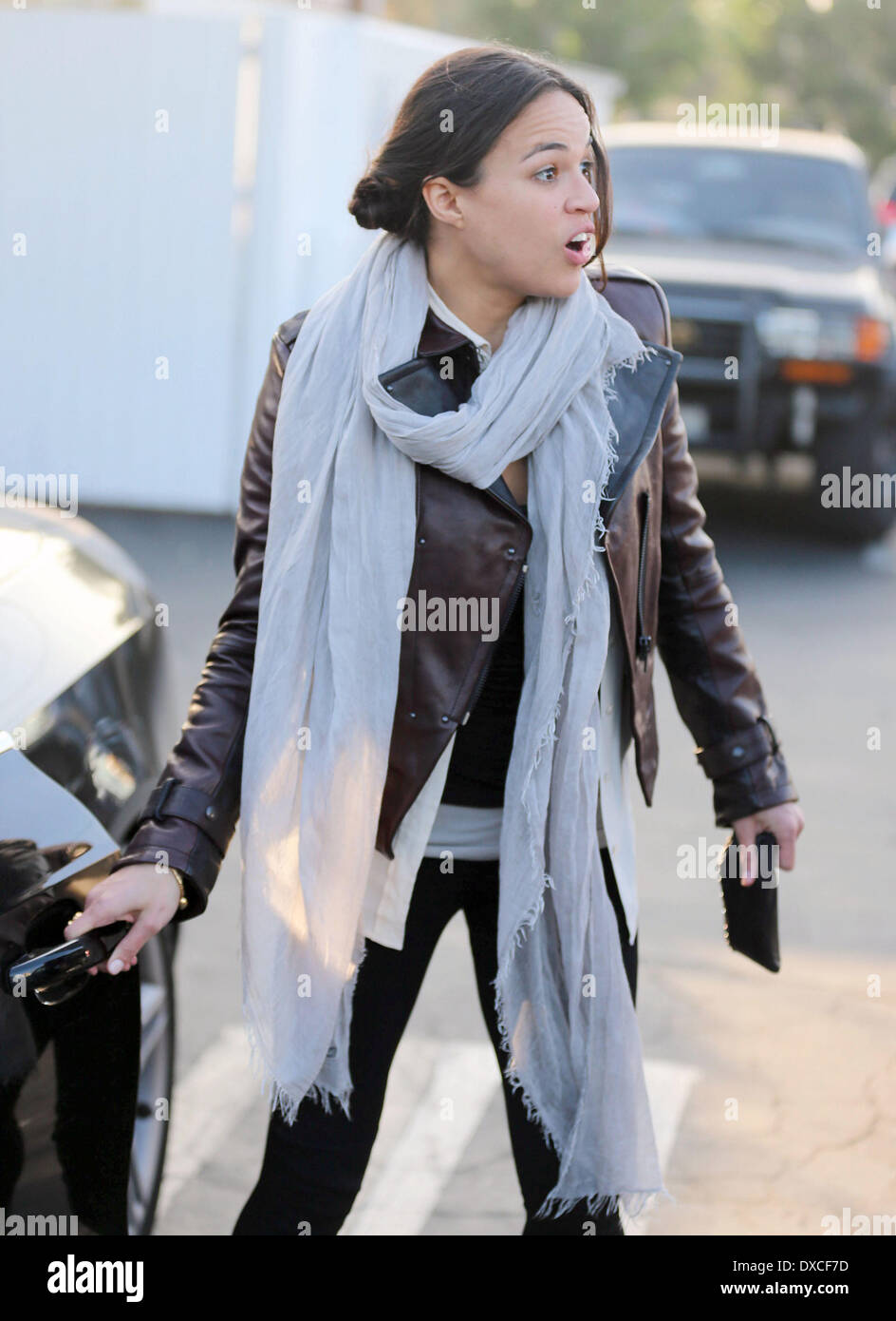 Michelle Rodriguez at her car after shopping at Fred Segal in West ...