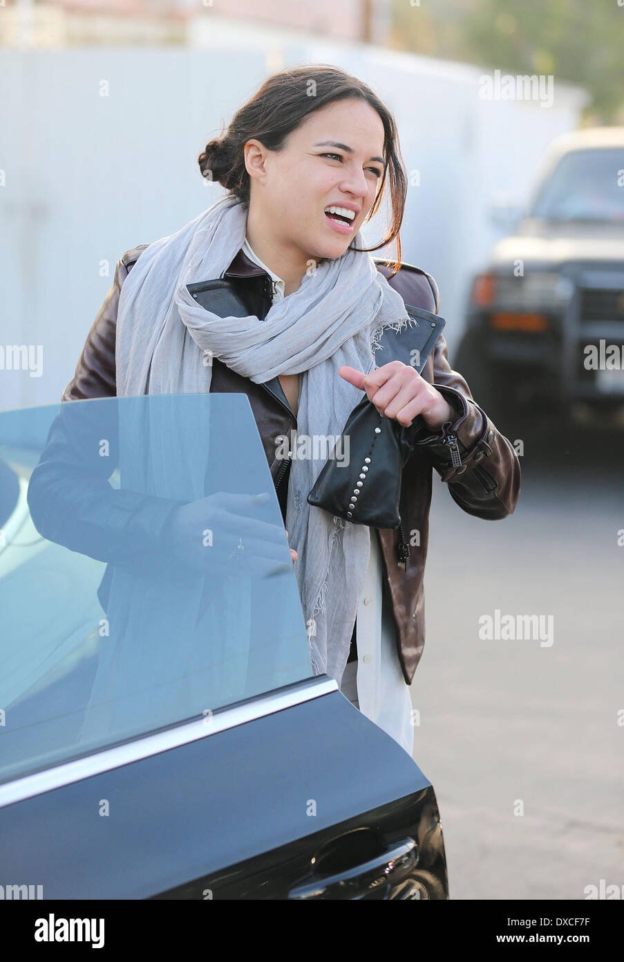 Michelle Rodriguez at her car after shopping at Fred Segal in West ...