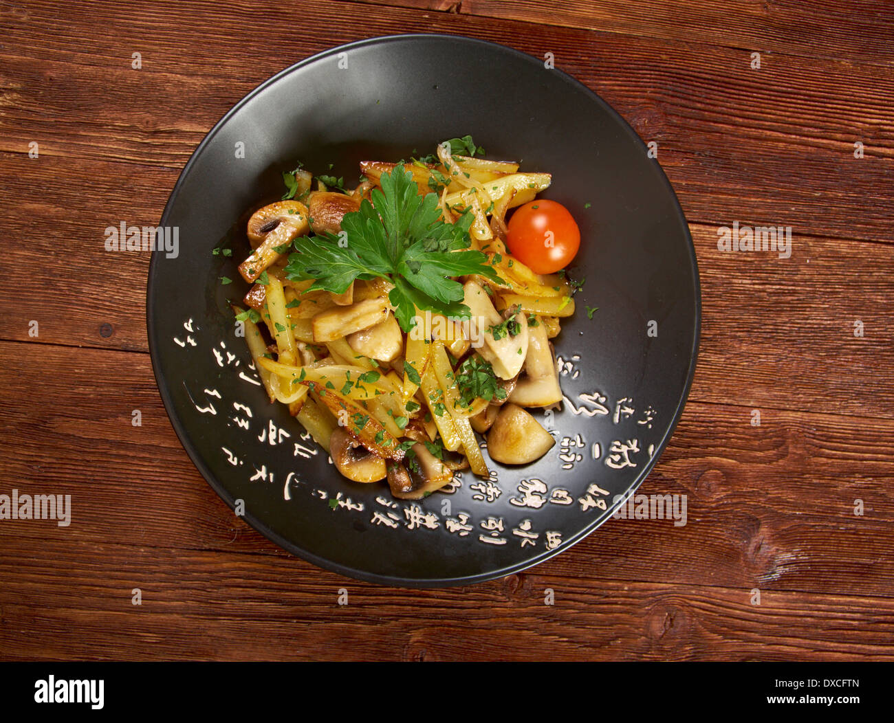 Chinese style . potato and mushroom stir fried Stock Photo - Alamy