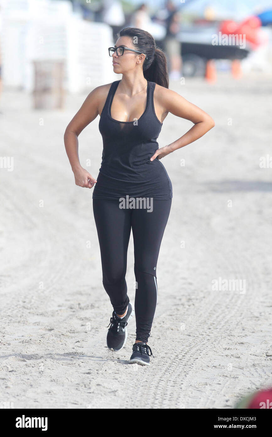 Kim Kardashian goes for an early morning run while taping her reality ...