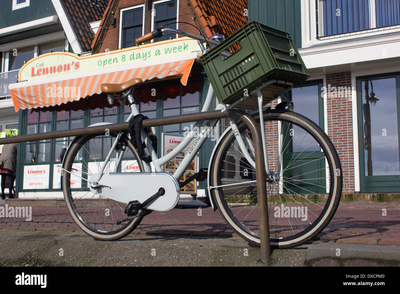 Light blue dutch bicycle with basket hi-res stock photography and ...