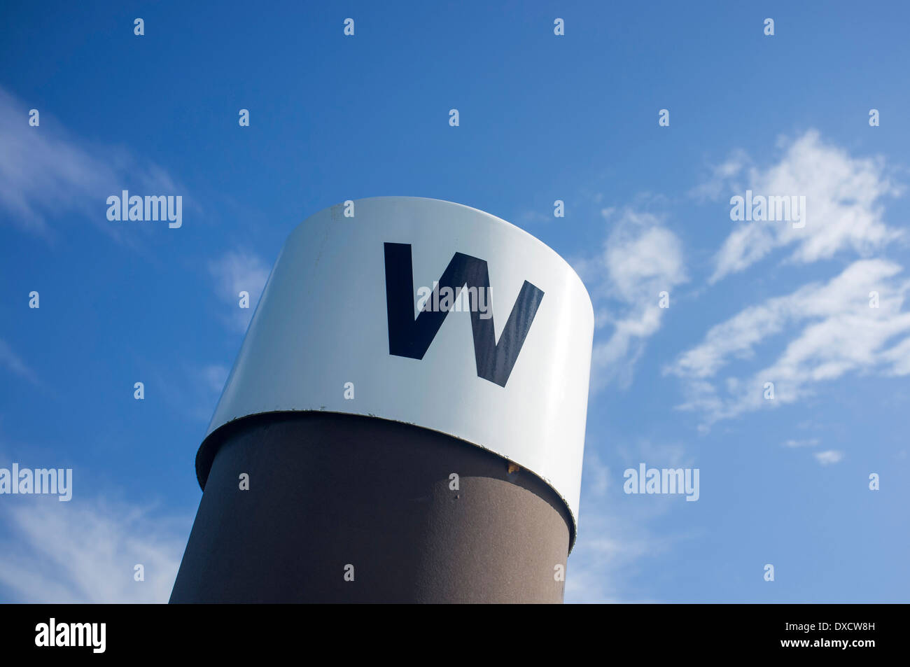 the letter w on a post Stock Photo - Alamy