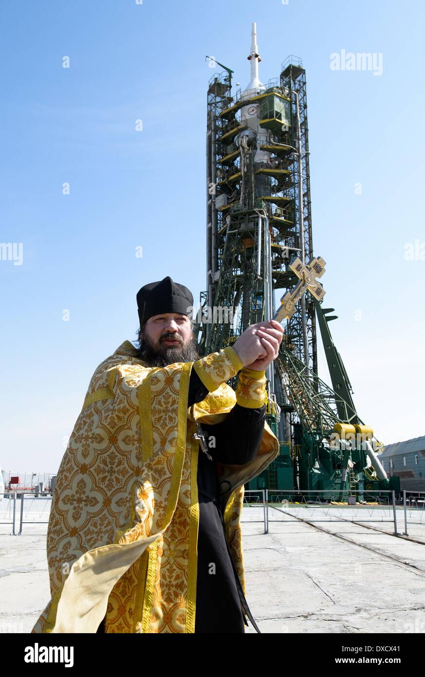 A Russian Orthodox priest blesses the Soyuz TMA-12M spacecraft on the ...