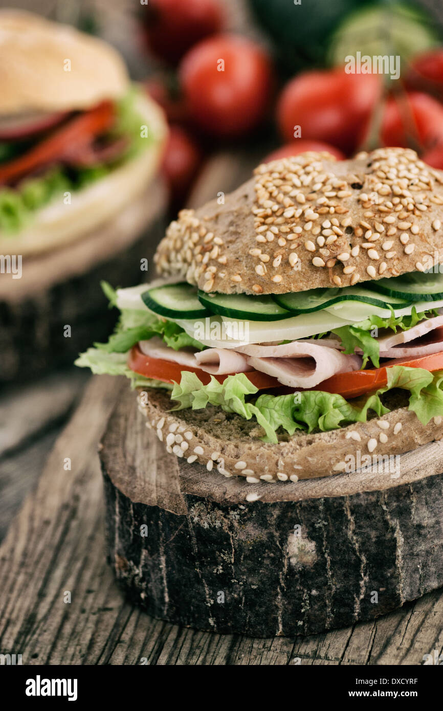 Sandwich in rustic setting. Fast food Stock Photo - Alamy