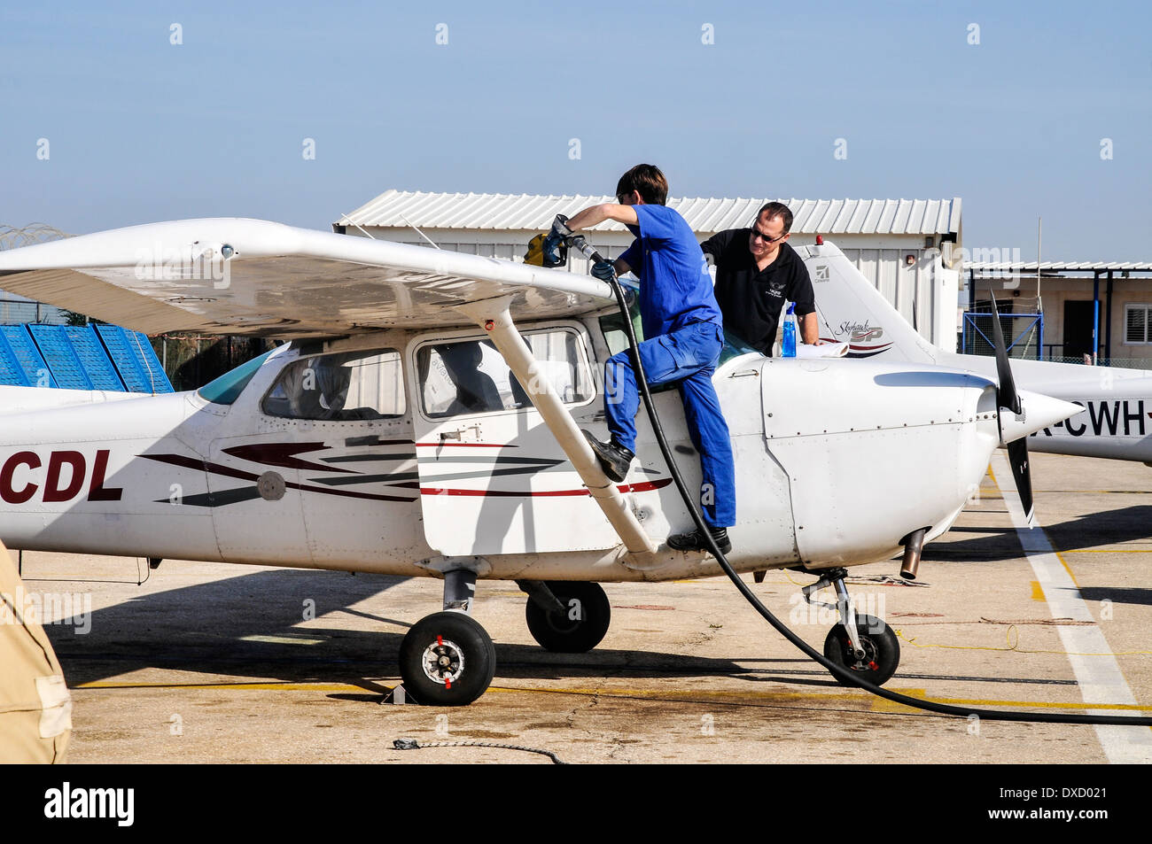 refueling a private airplane at an airstrip Stock Photo - Alamy