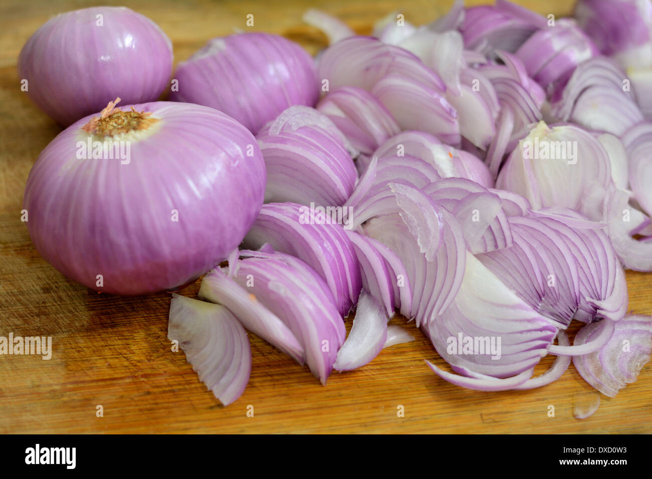 Onion, cut and whole Stock Photo - Alamy