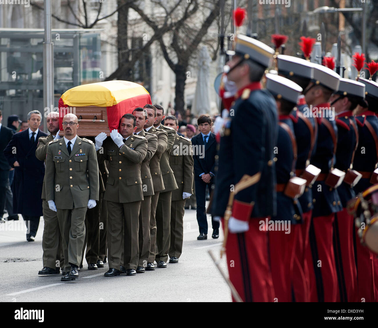Madrid. 23rd Mar, 2014. Military officers carry the coffin of former ...