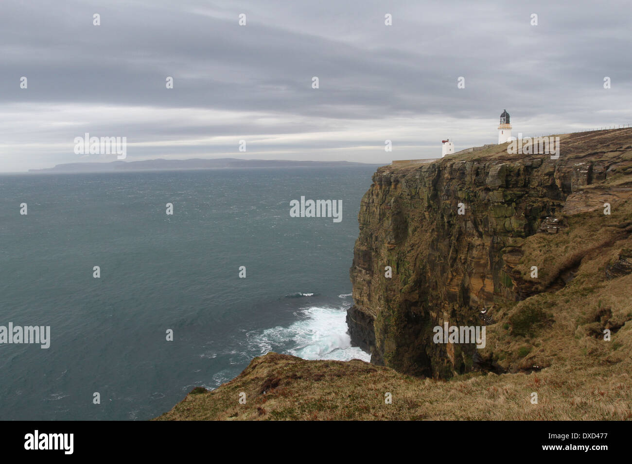 Cliffs and Dunnet Head lighthouse Caithness Scotland March 2014 Stock ...