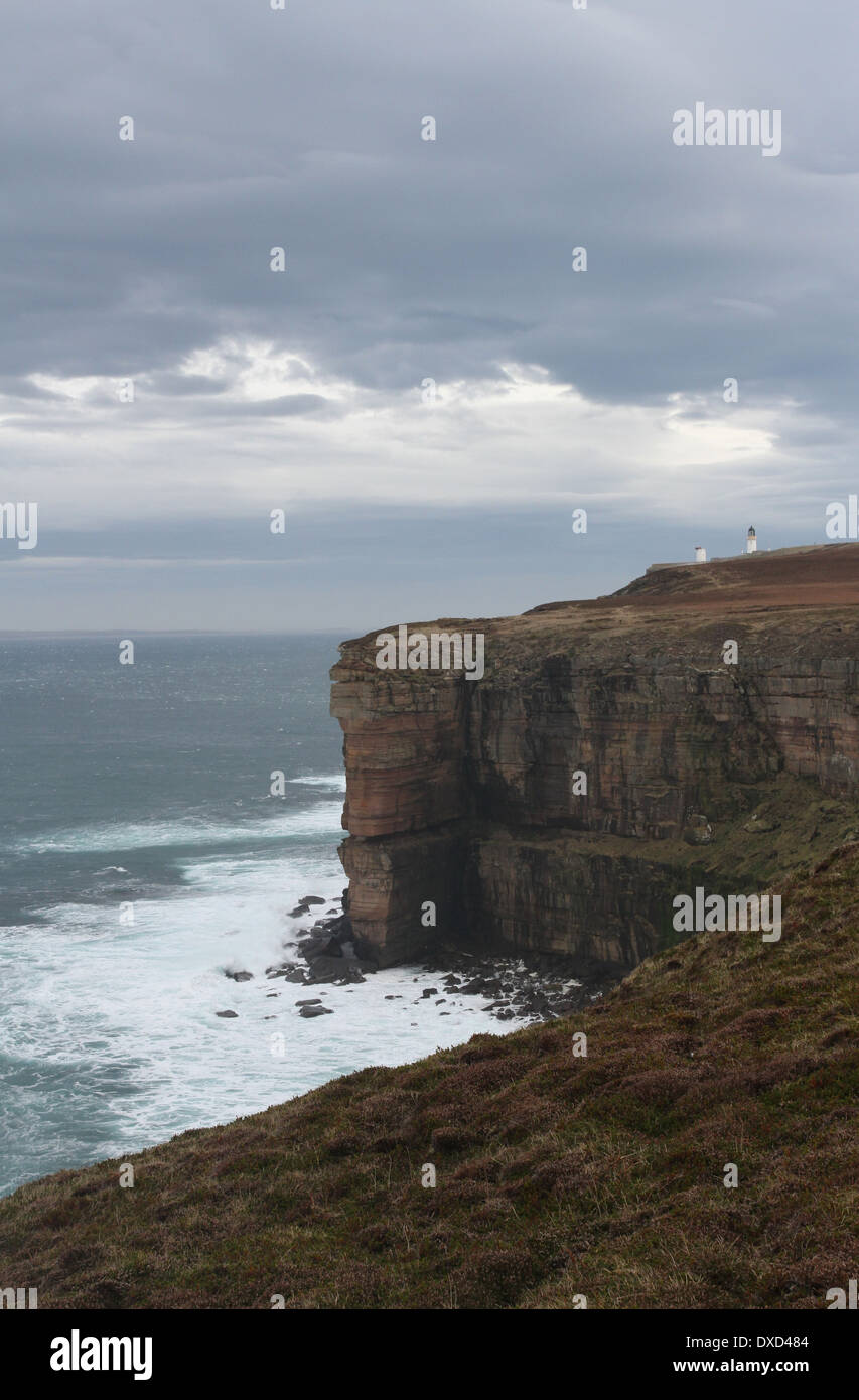 Cliffs and Dunnet Head lighthouse Caithness Scotland March 2014 Stock ...
