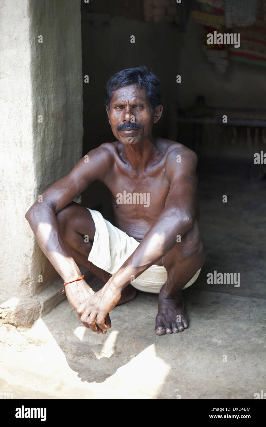 Portrait of a poor tribal man. Soren tribe. Jamuniatand village, Bokaro ...