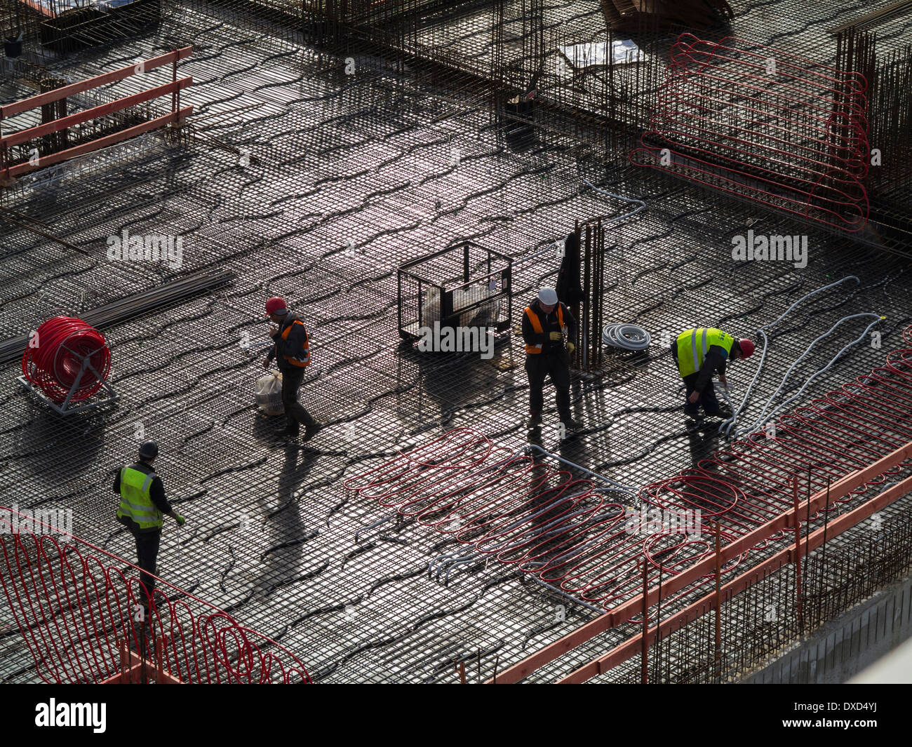 Construction workers on a city centre construction site Stock Photo - Alamy