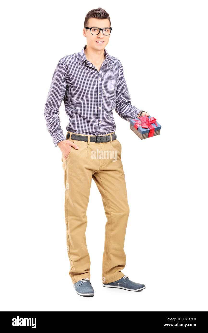 Full length portrait of a man holding a present Stock Photo - Alamy