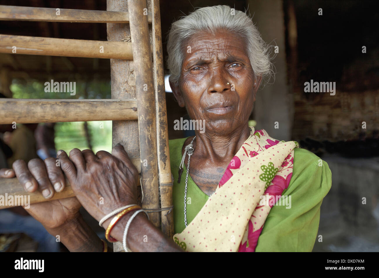 Portrait of an old tribal woman. Santhal tribe. Jarkatand village ...