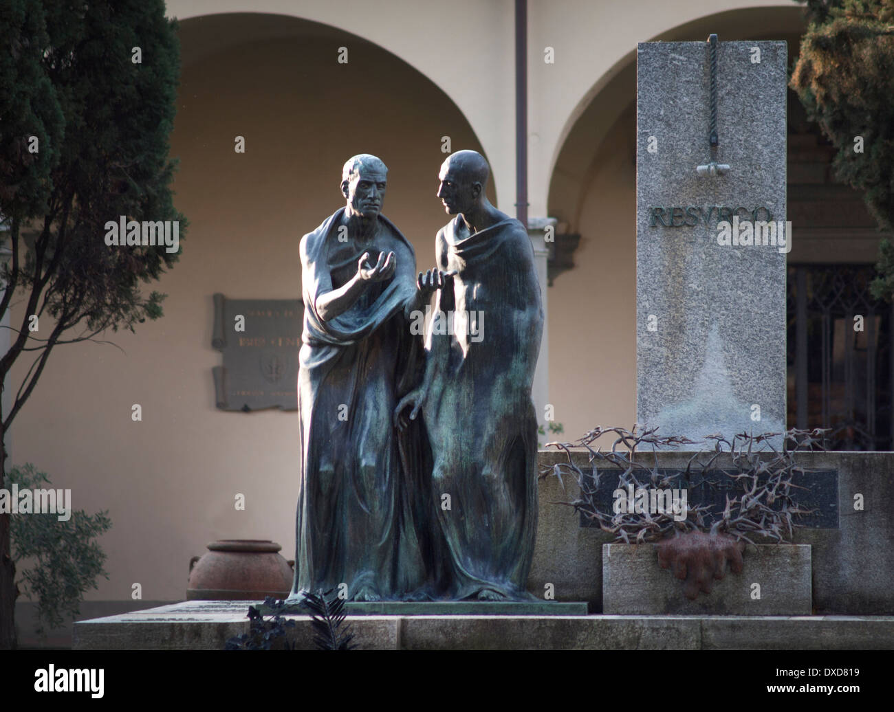 In the courtyard of a monastery in Florence a bronze statue of two ...