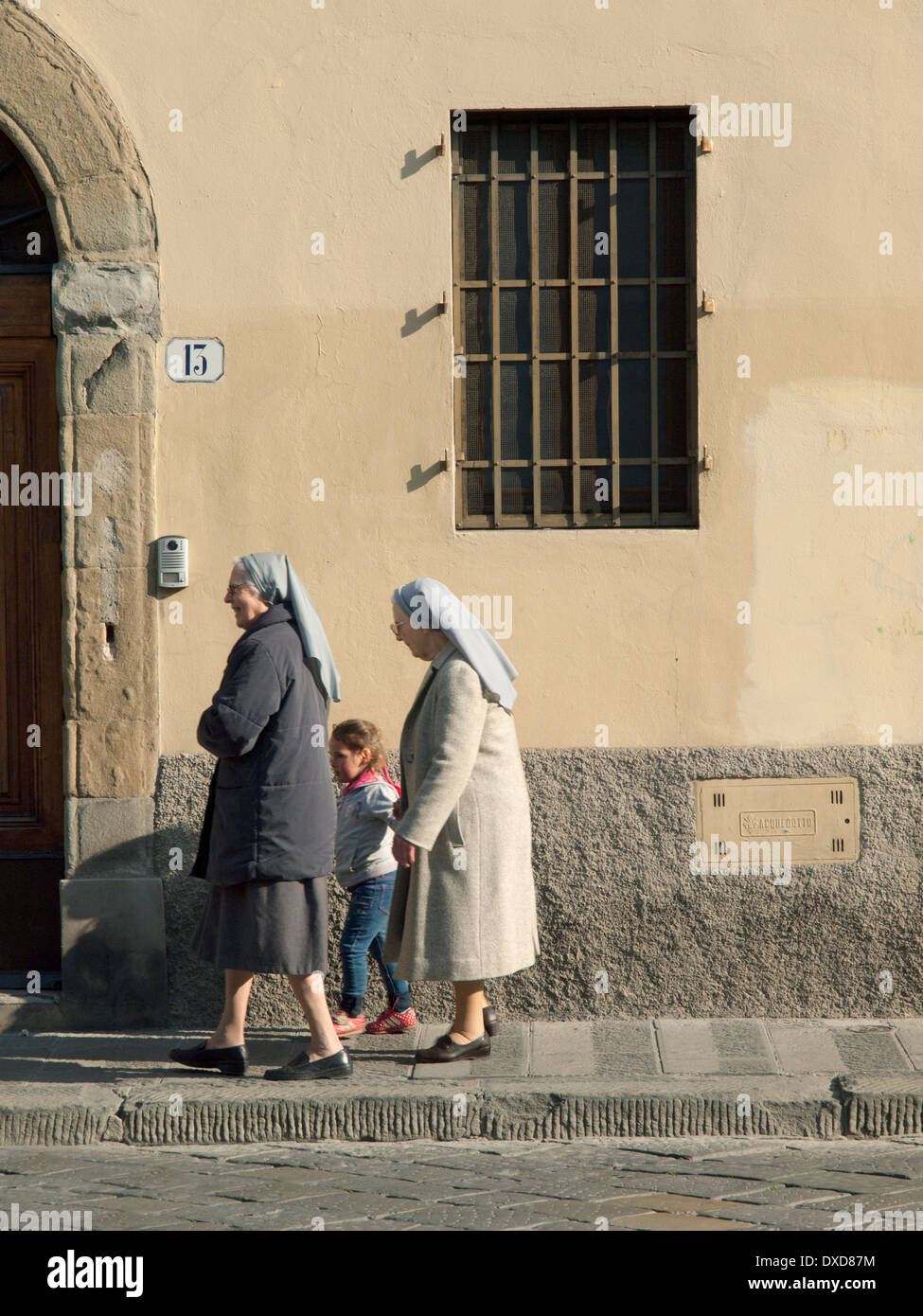 Two young nuns walking hi-res stock photography and images - Alamy