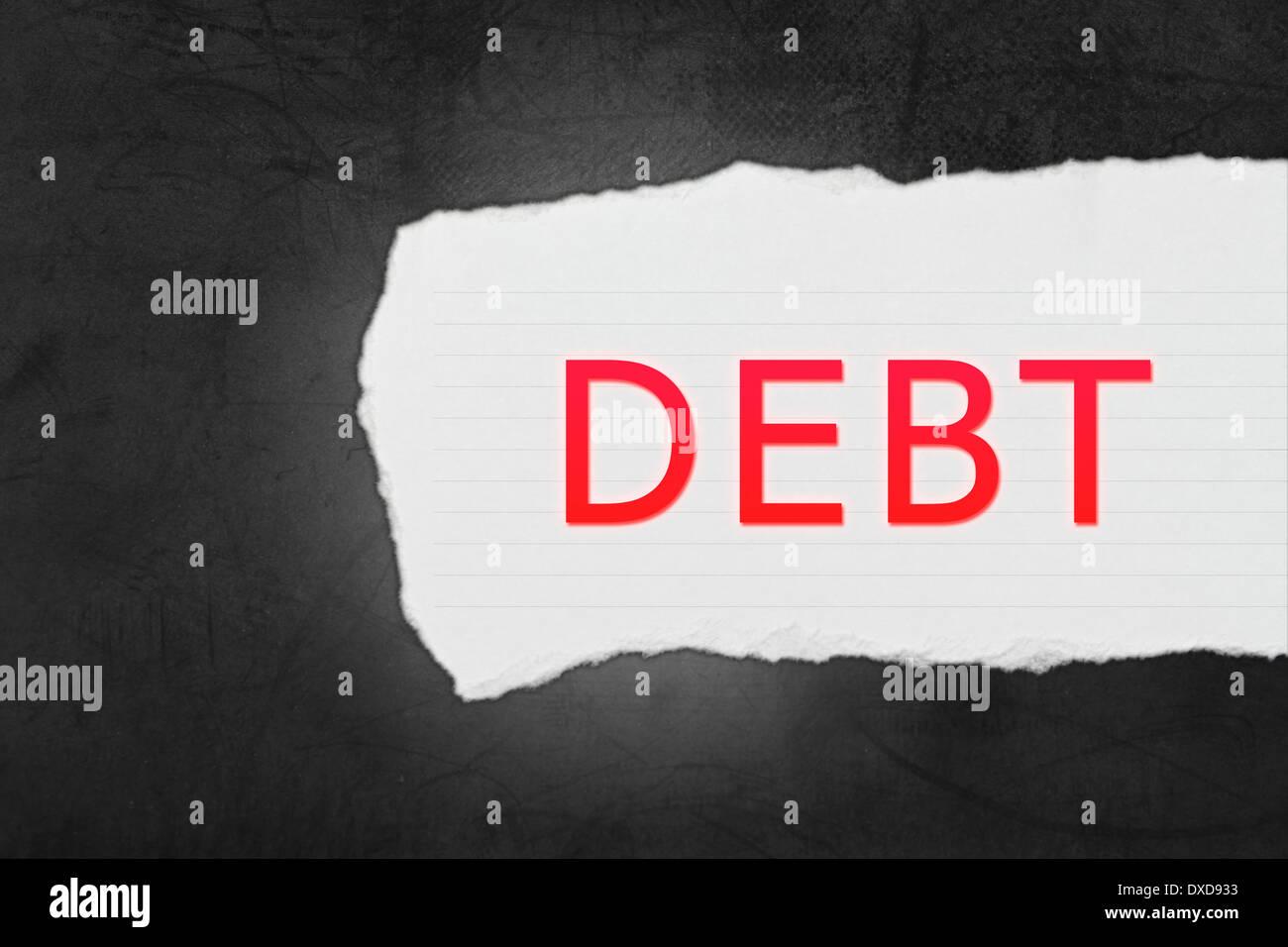 Debt with paper tears on black texture Stock Photo - Alamy