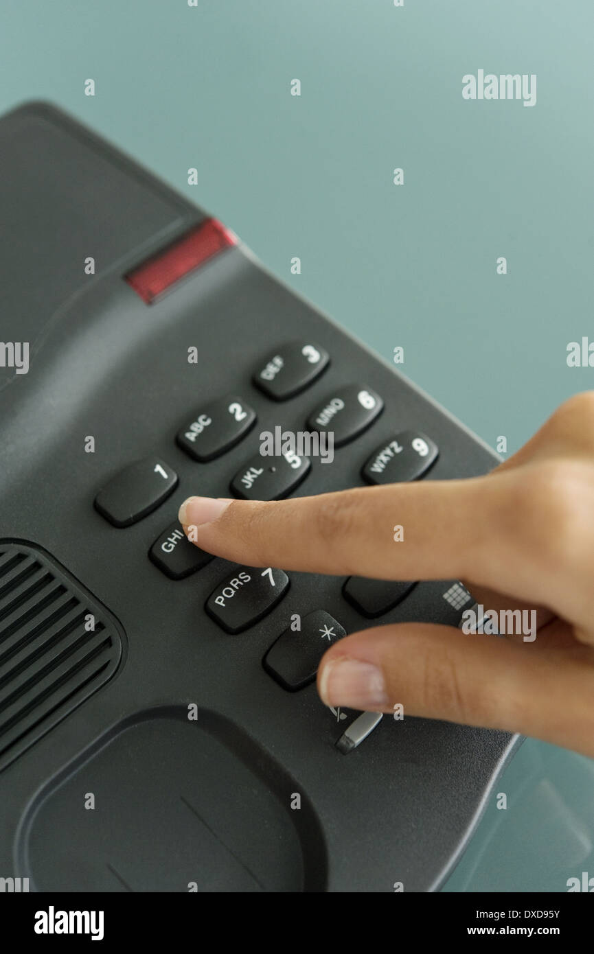 Closeup of woman's hand telephoning Stock Photo - Alamy