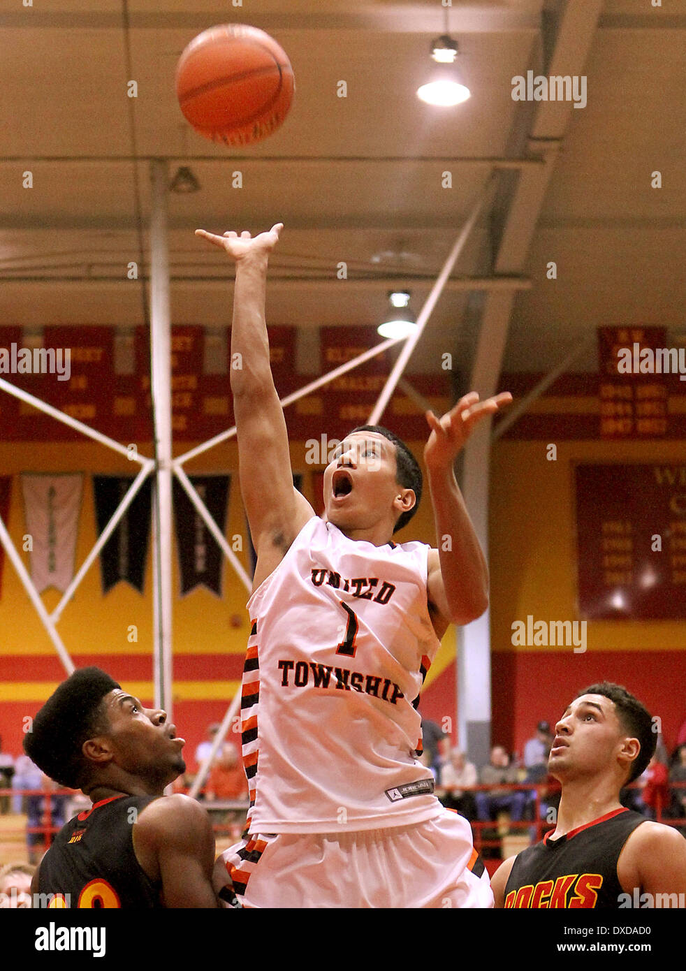 March 7, 2014 - Rock Island, Iowa, U.S. - UTHS guard Grant Webb puts up a shot against Rock ...