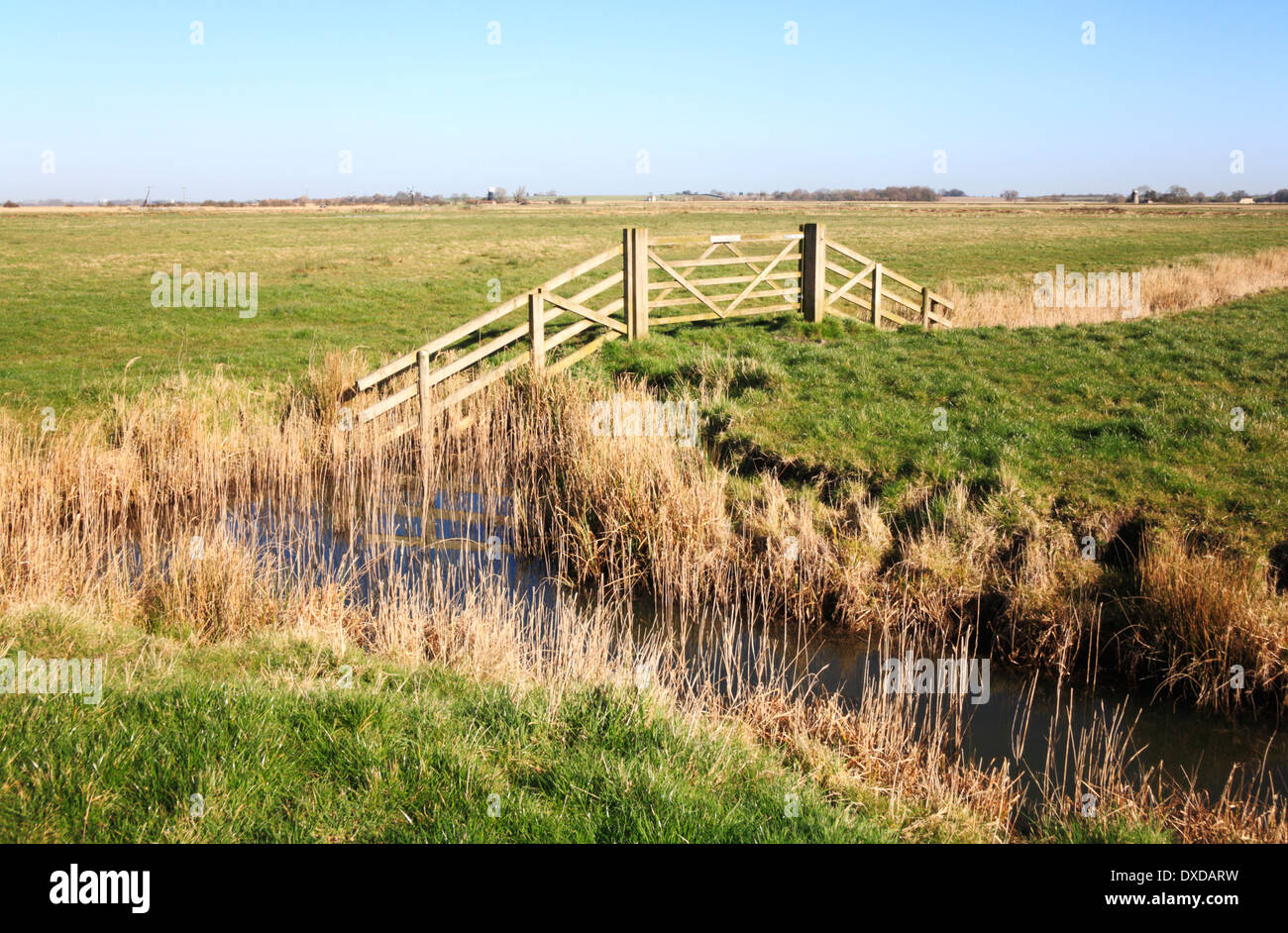A view of Upton Marshes with drainage dyke and five bar gate on the ...