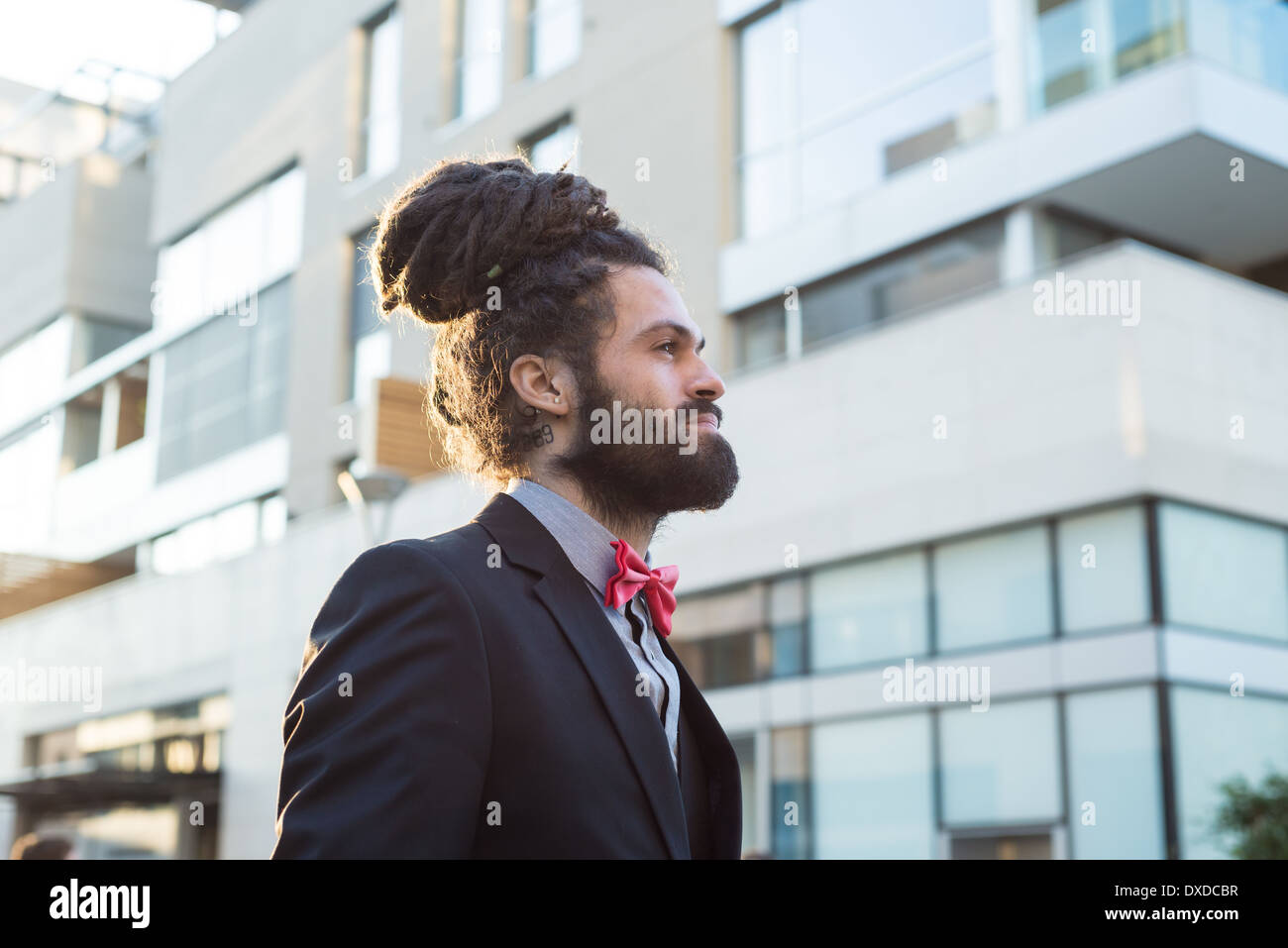 Stylish elegant dreadlocks businessman in business landscape Stock ...