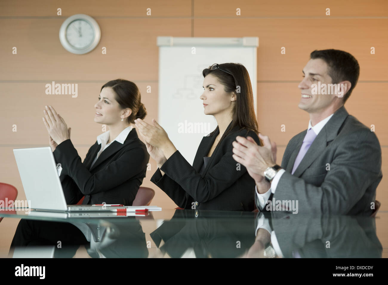 Business people at presentation clapping Stock Photo - Alamy