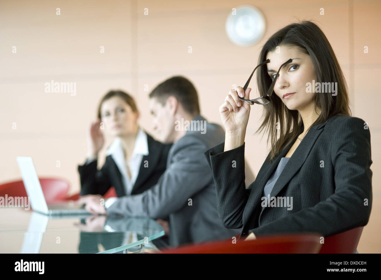 Business people at conference table Stock Photo - Alamy