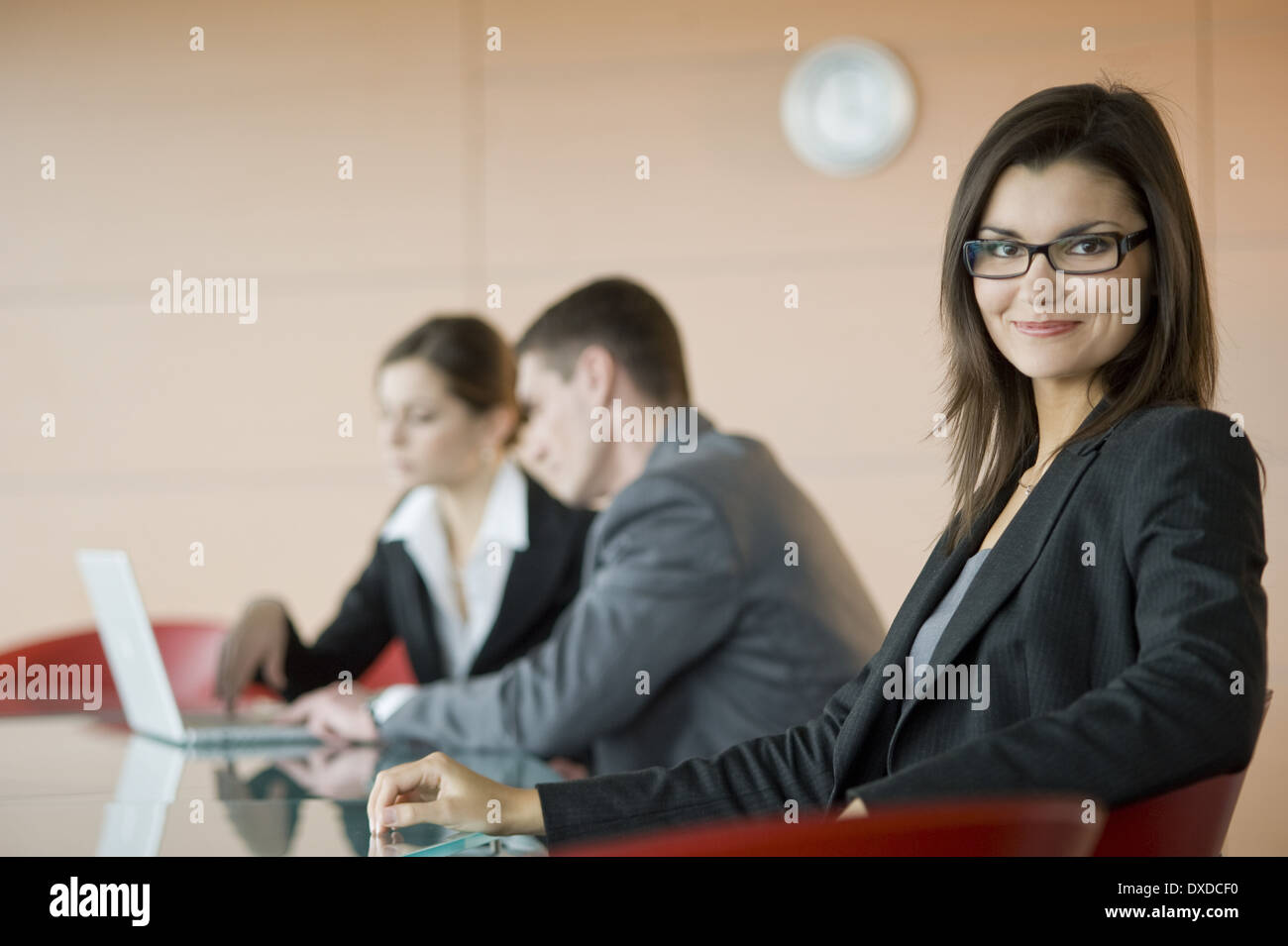 Business people at conference table Stock Photo - Alamy