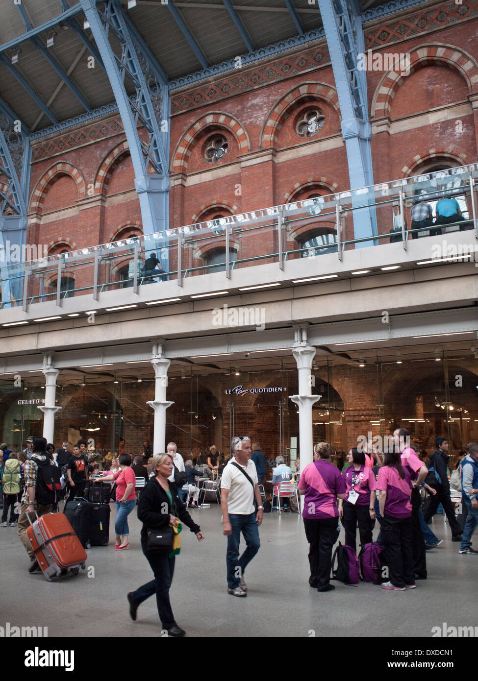 Shops, cafes, and travellers at St Pancras Station, London, England ...