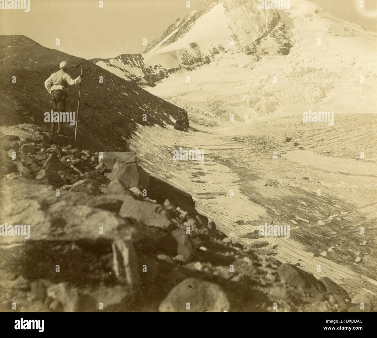 Circa 1890 antique photograph, scientist viewing an alpine glacier ...