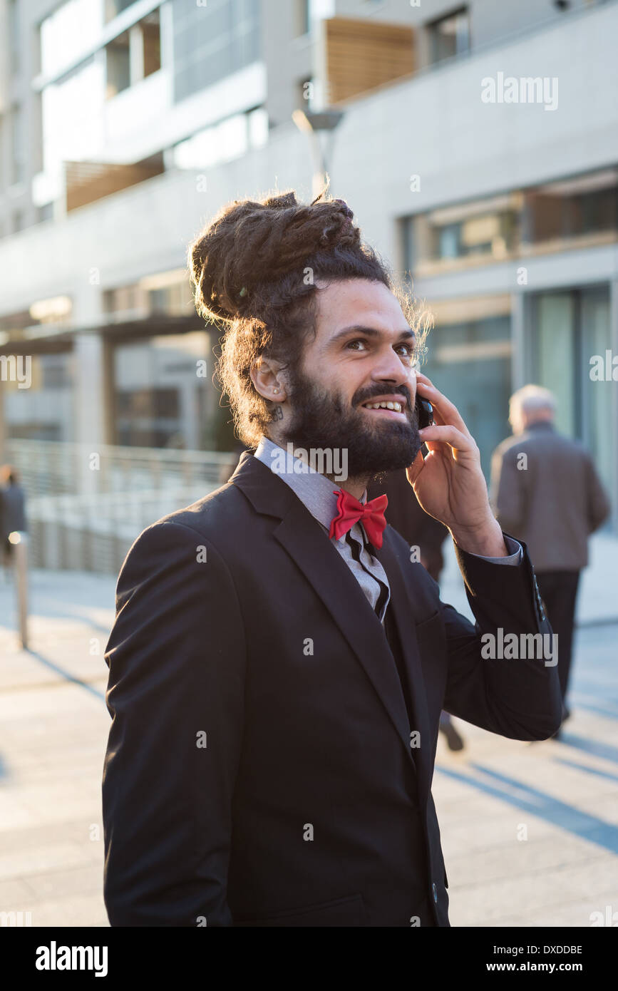 Stylish elegant dreadlocks businessman in business landscape Stock ...
