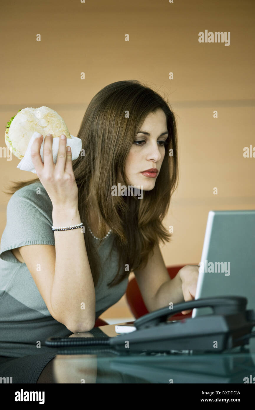 Busy people eating sandwich hi-res stock photography and images - Alamy
