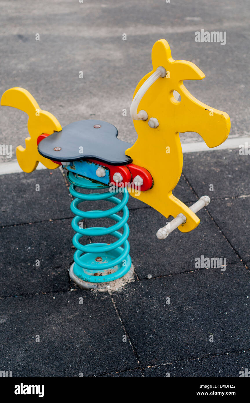 Playground with rocking horse hi-res stock photography and images - Alamy
