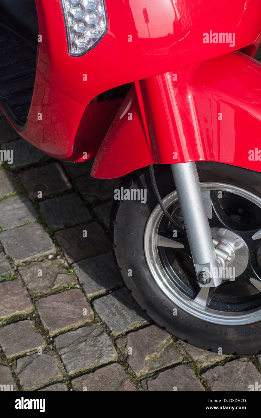 Detail of a red scooter Stock Photo - Alamy