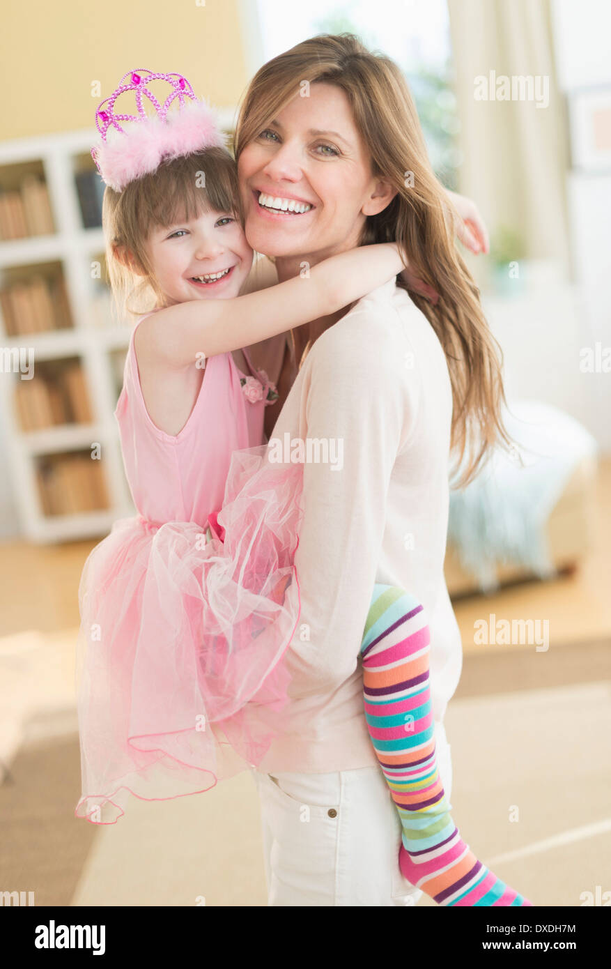 Portrait of mother and daughter (4-5) wearing tutu Stock Photo - Alamy