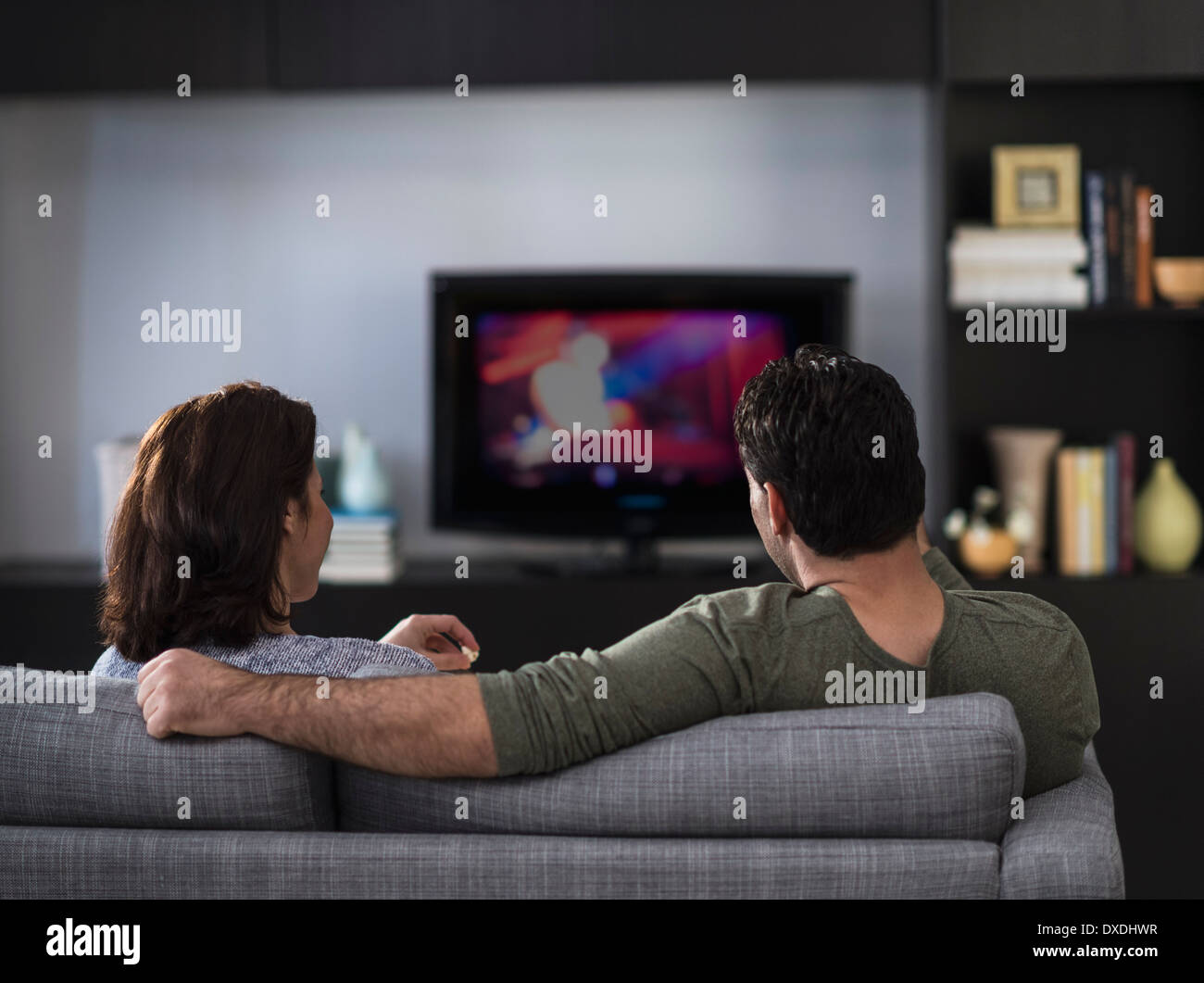 Couple watching tv rear view hi-res stock photography and images - Alamy