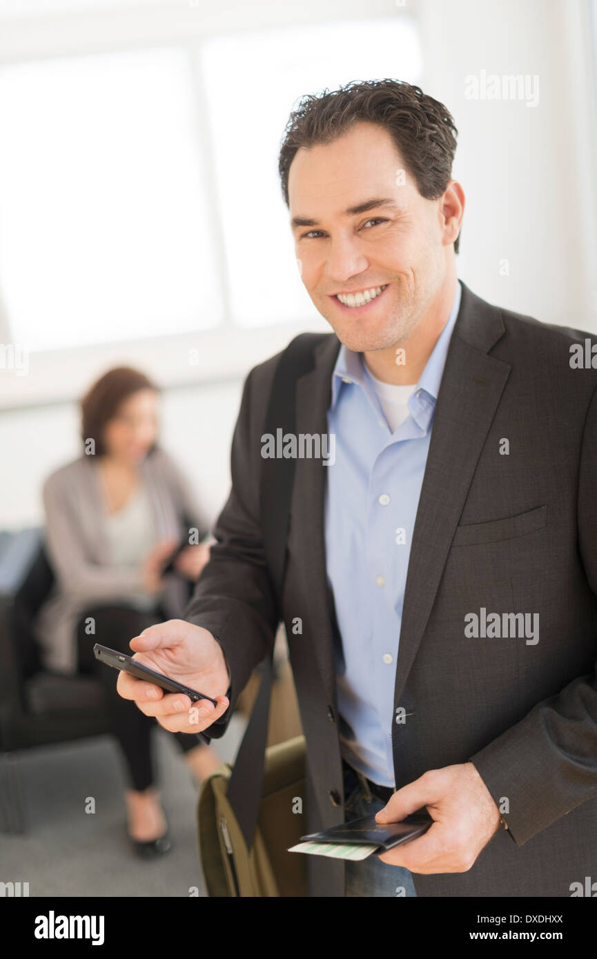 Airport terminal mature businessman using hi-res stock photography and ...