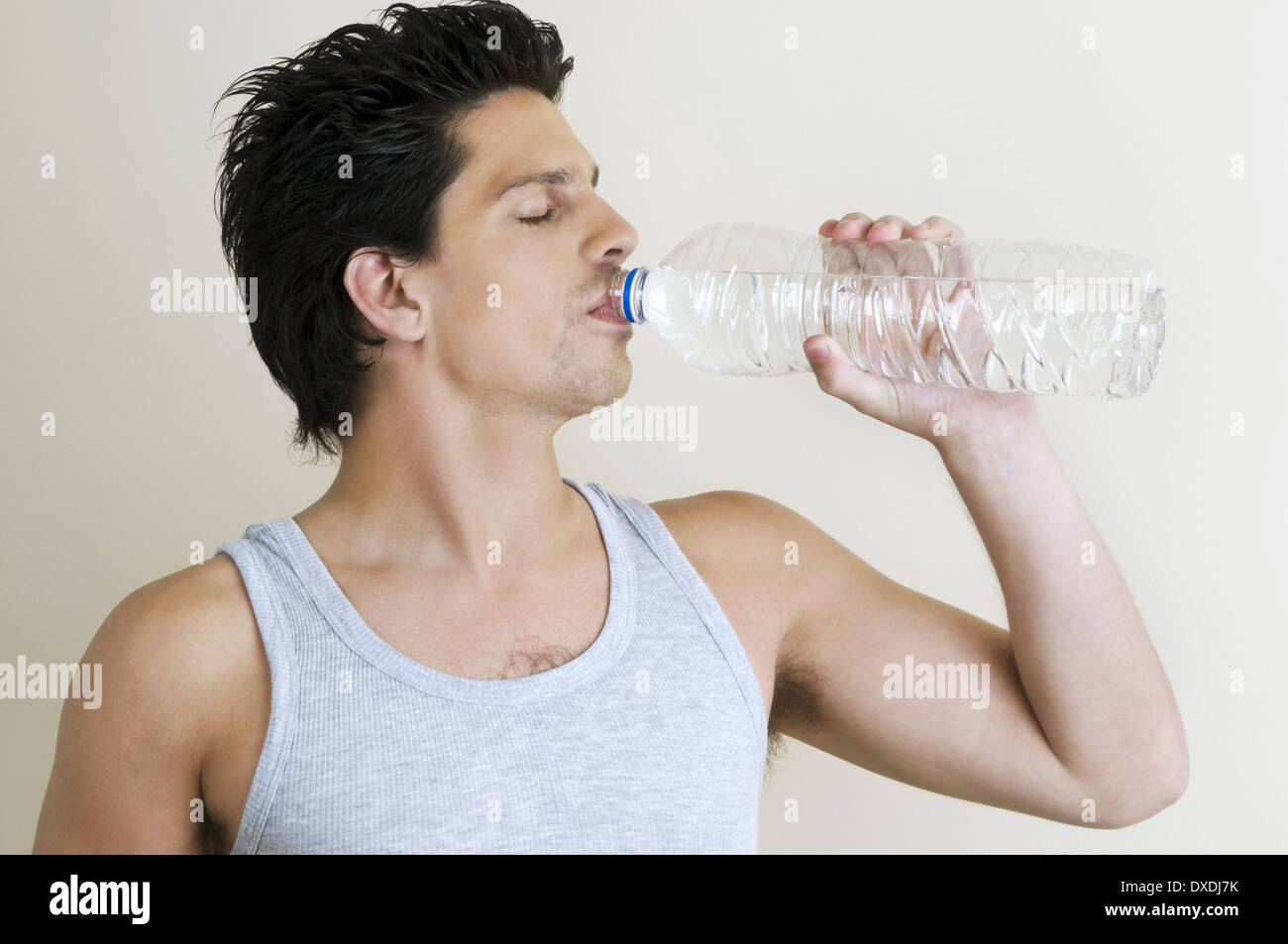 Man drinking bottled water hi-res stock photography and images - Alamy