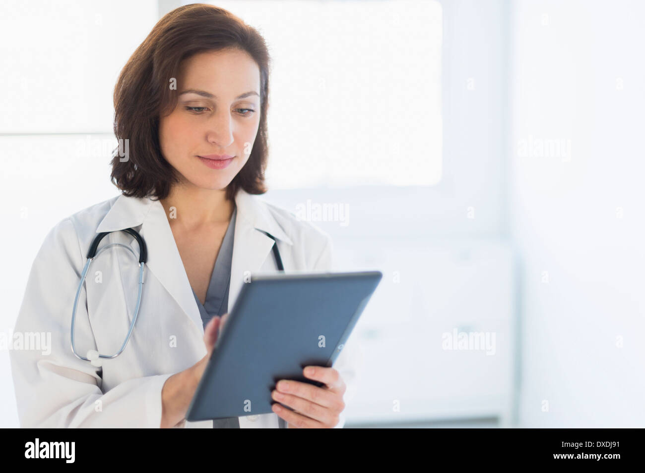 Female professional holding digital hi-res stock photography and images ...