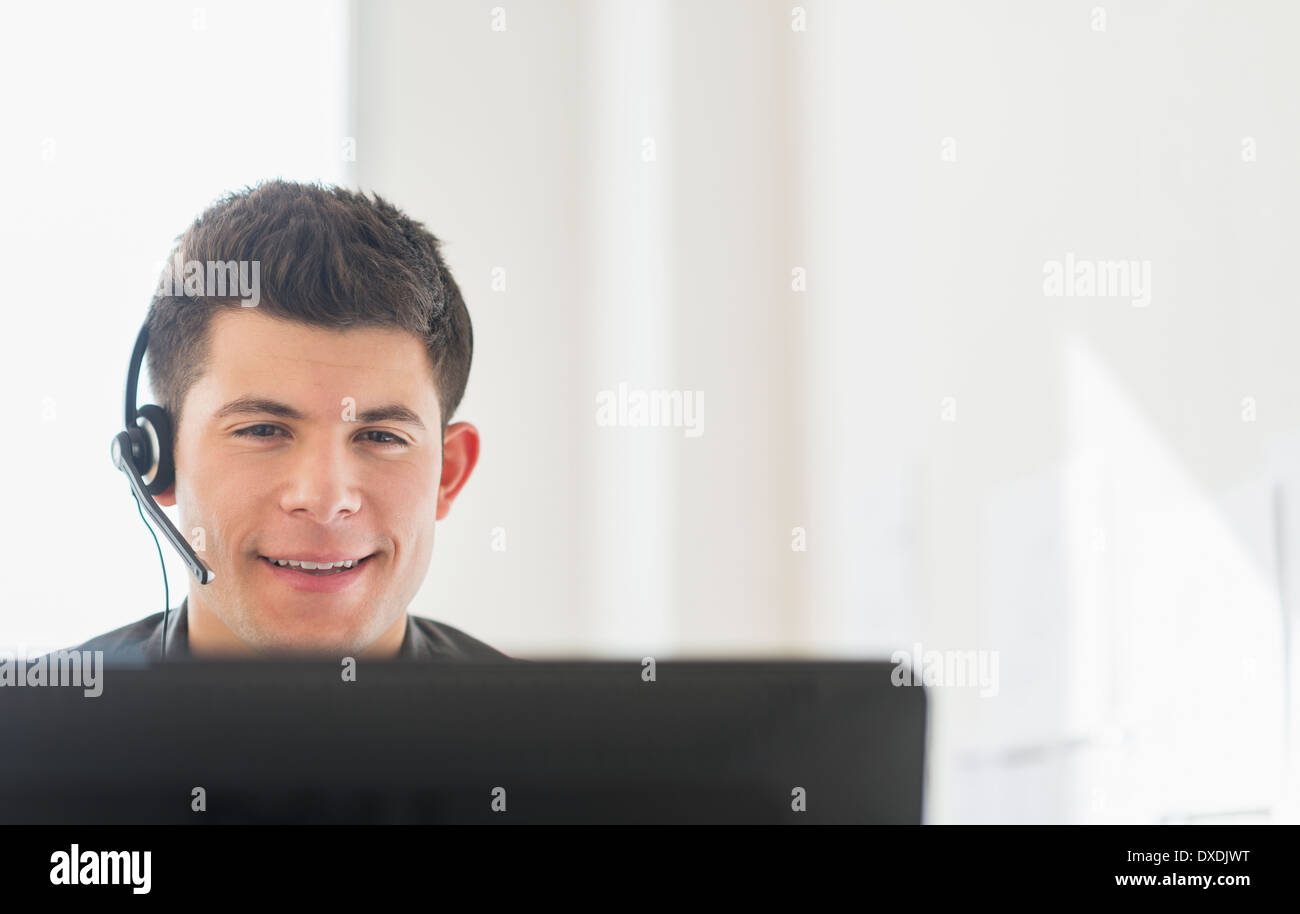 Young man in front of the computer hi-res stock photography and images ...