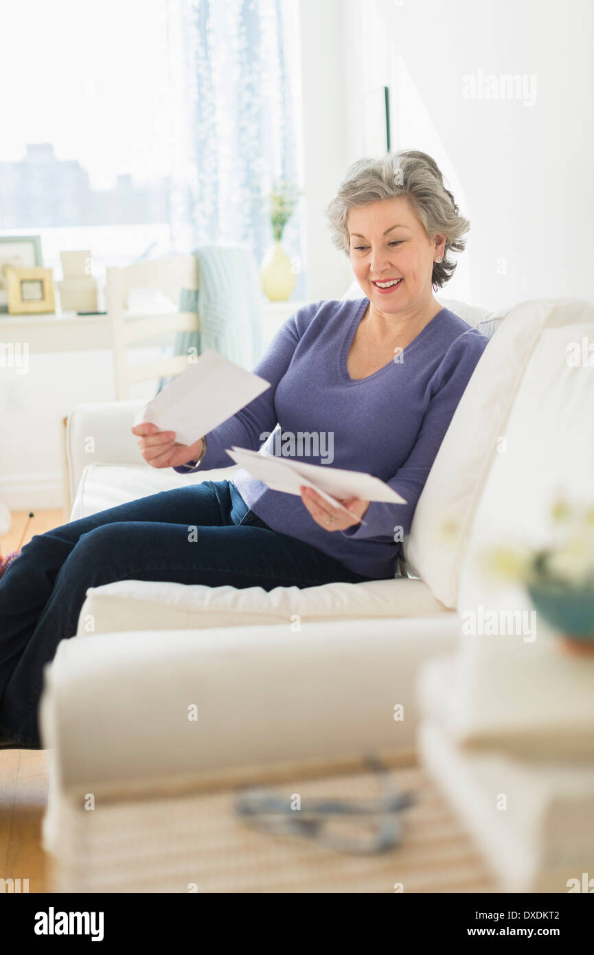 Sitting on letters hi-res stock photography and images - Alamy