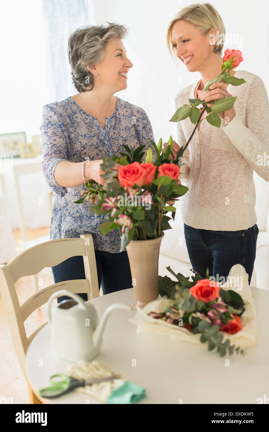 Two women arranging bouquet Stock Photo - Alamy