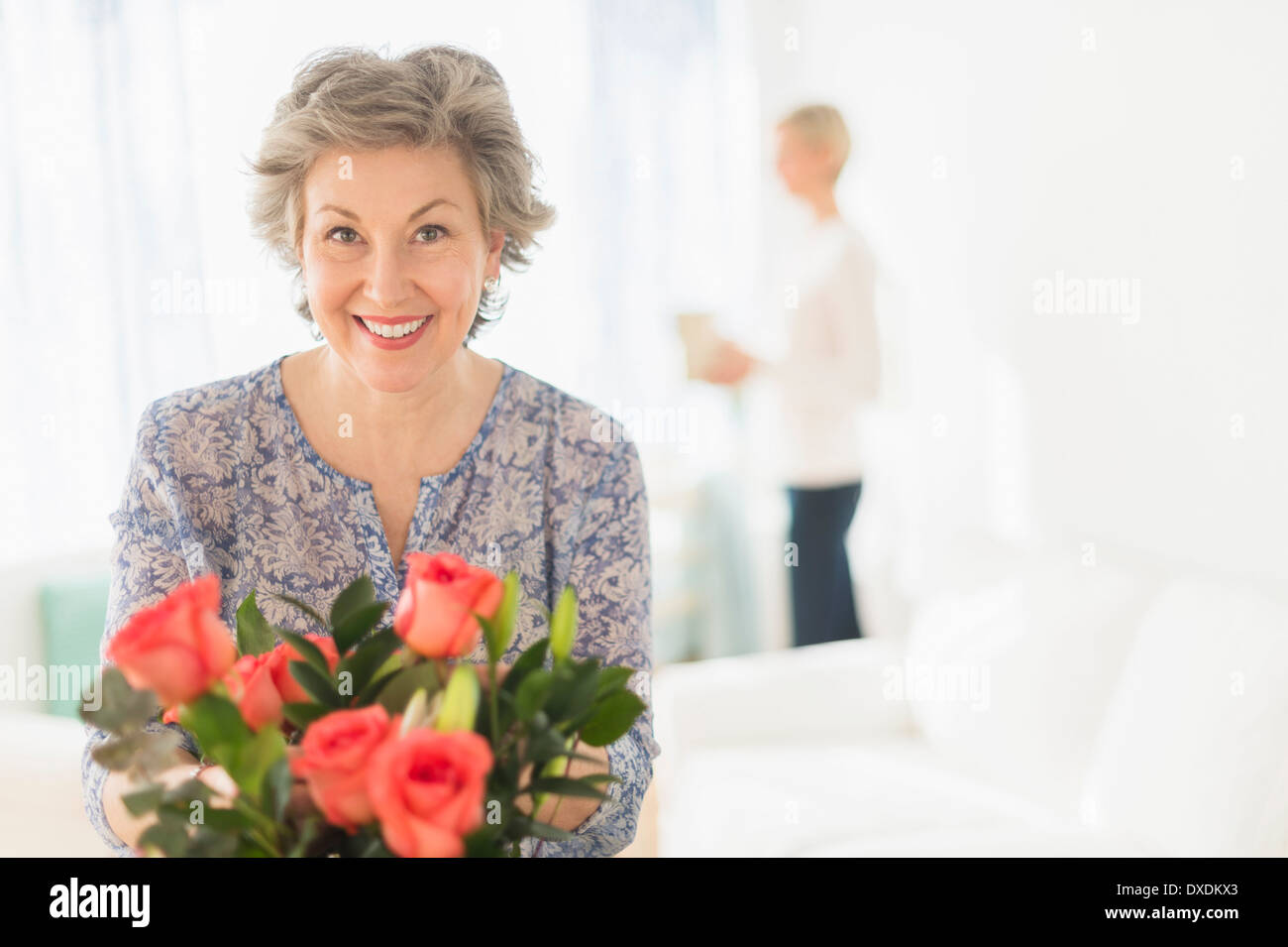 Senior woman arranging colorful hi-res stock photography and images - Alamy